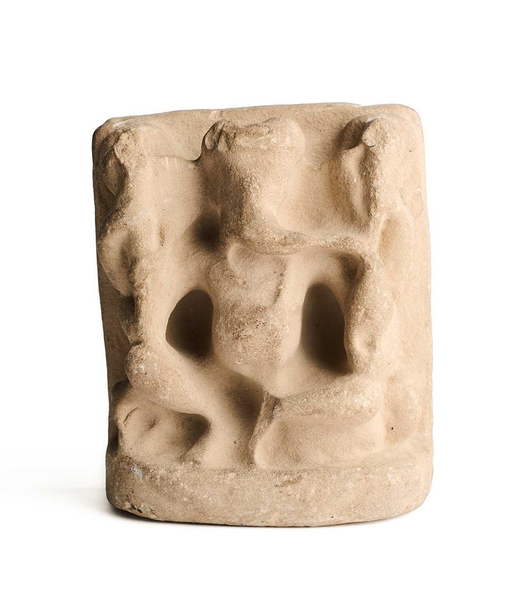 Lot 153 - A SMALL BUFF SANDSTONE RELIEF DEPICTING