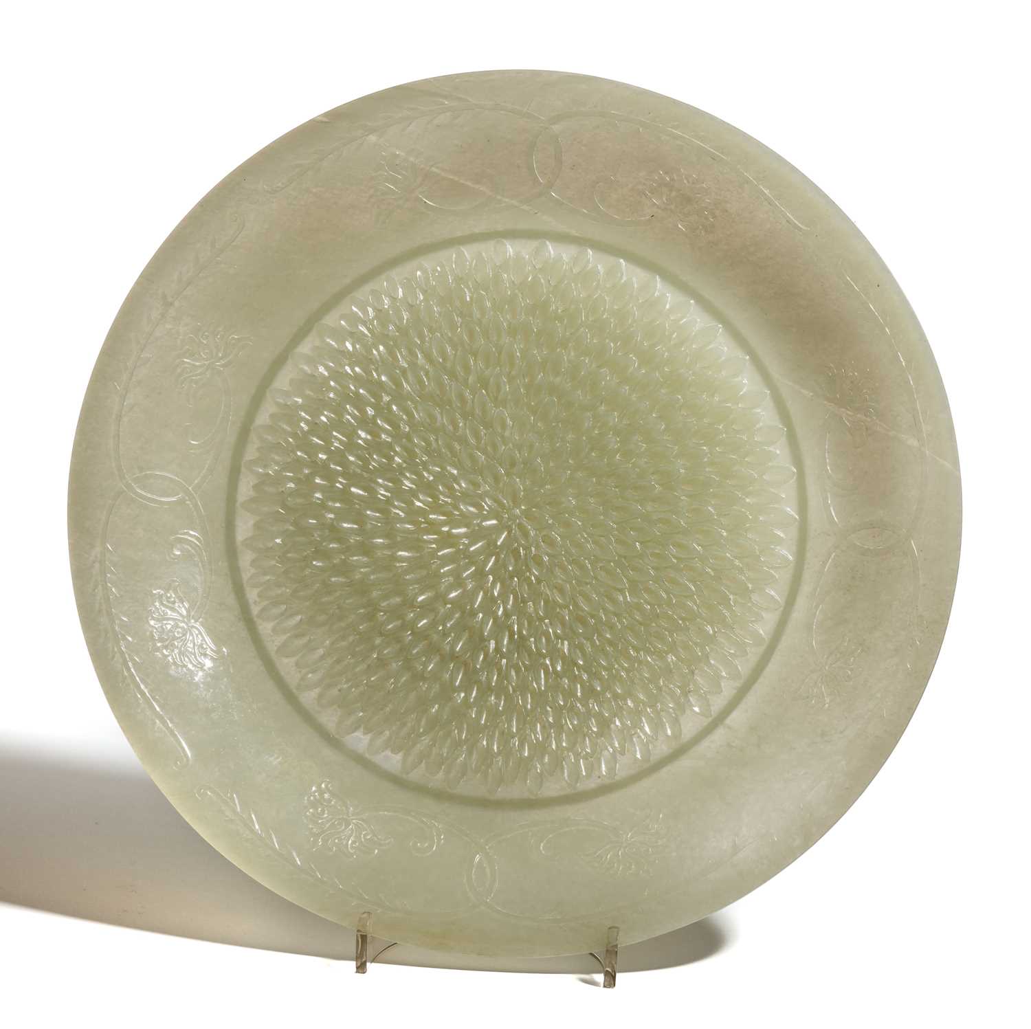 Lot 68 - A CHINESE CARVED JADEITE DISH^ 20TH