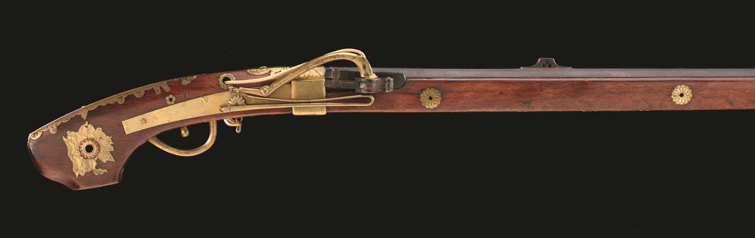 Lot 37 - **A JAPANESE SNAP-MATCHLOCK MUSKET
