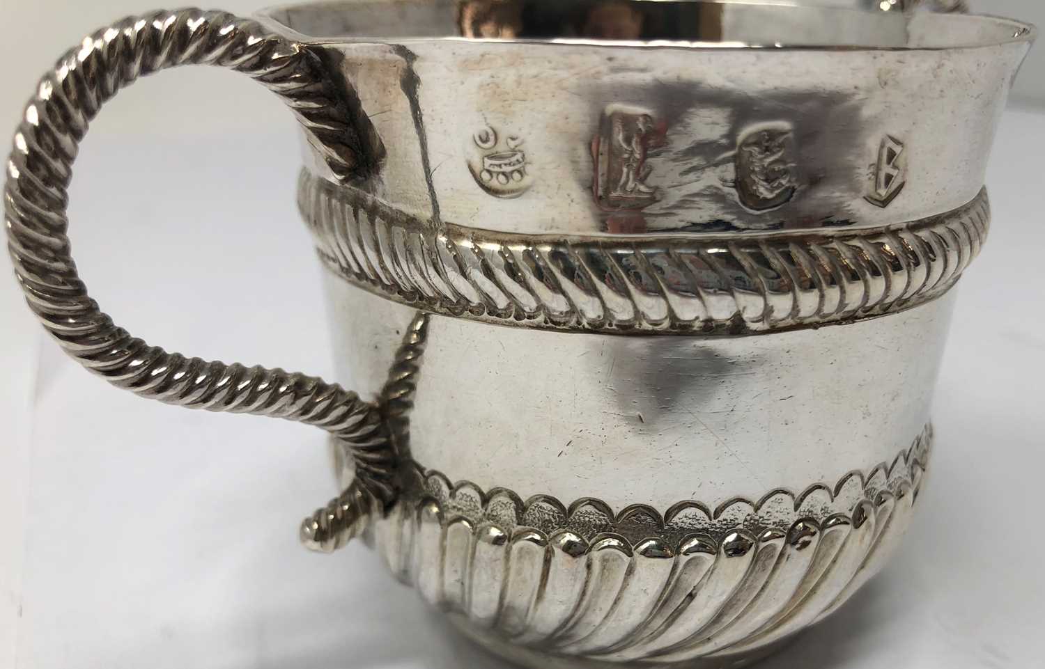 Lot 409 - A WILLIAM III SILVER PORRINGER^ JOHN CORY^