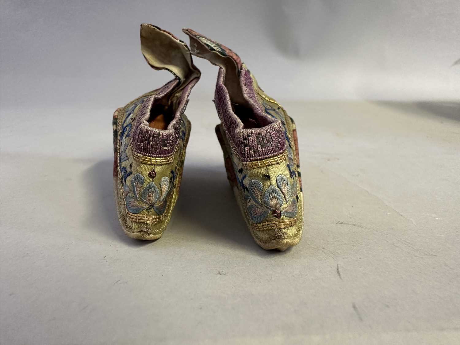 Lot 58 - A RARE PAIR OF CHINESE MINIATURE BOUND SHOES,