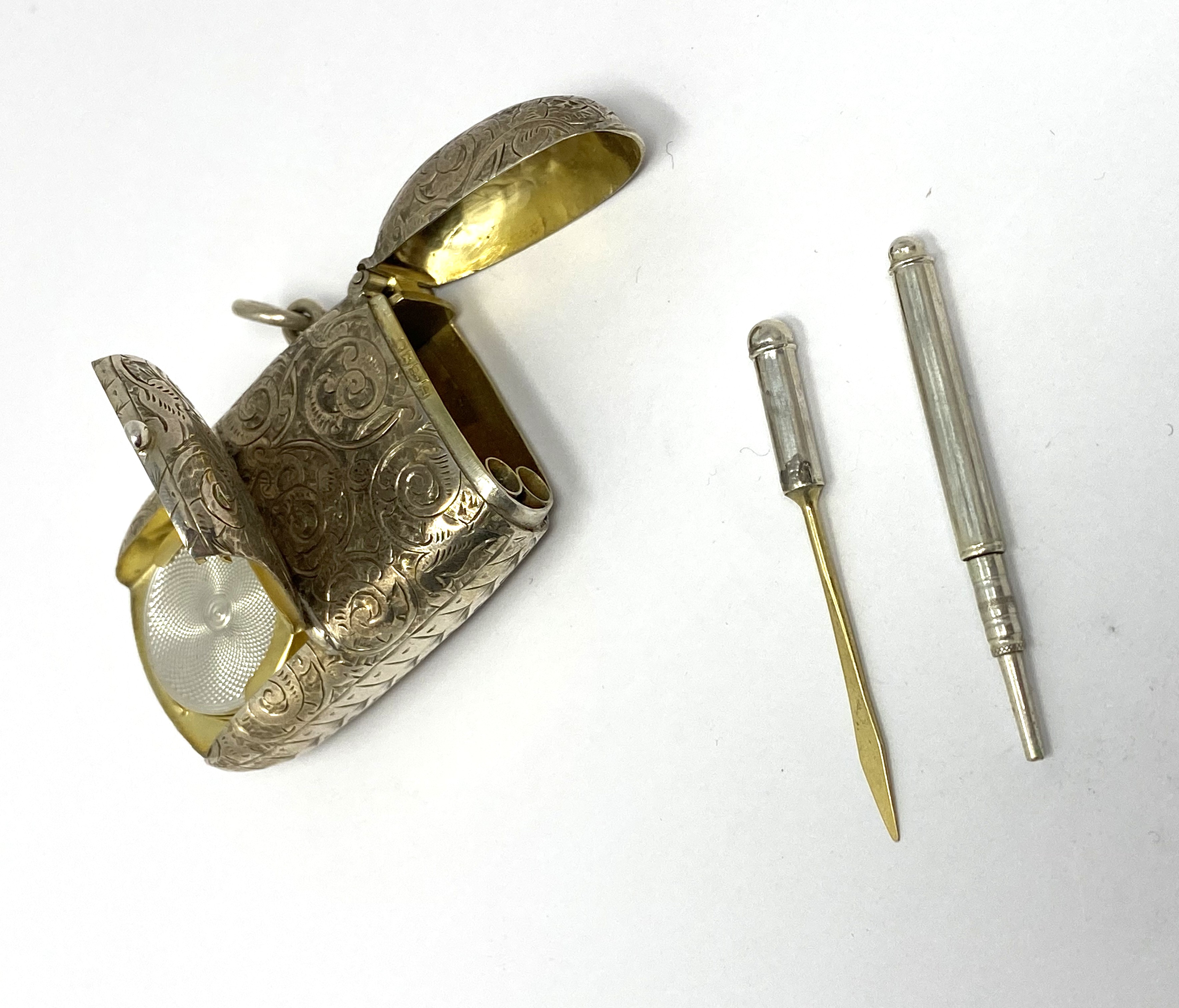 Lot 12 - A VICTORIAN SILVER PATENT COMBINATION VESTA,
