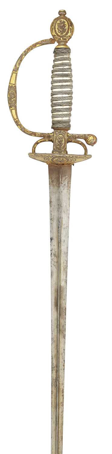 Lot 141 - A FRENCH SMALL-SWORD WITH CHISELLED AND GILT