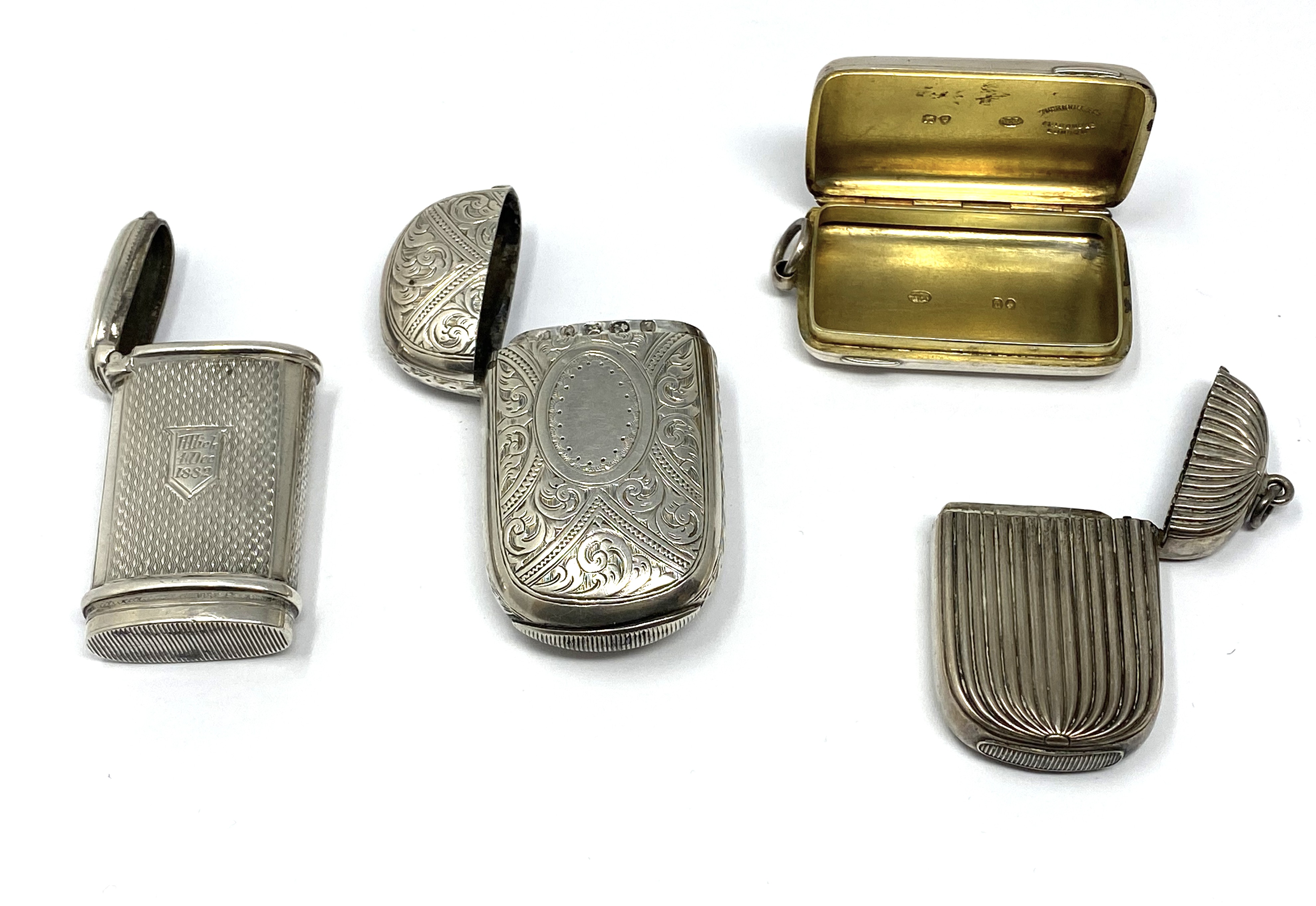 Lot 41 - FOUR VICTORIAN SILVER VESTA CASES, 1874-1887