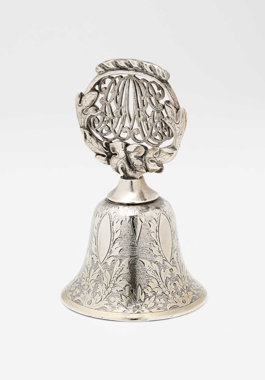 Lot 129 - A VICTORIAN PARCEL-GILT-SILVER TABLE BELL,