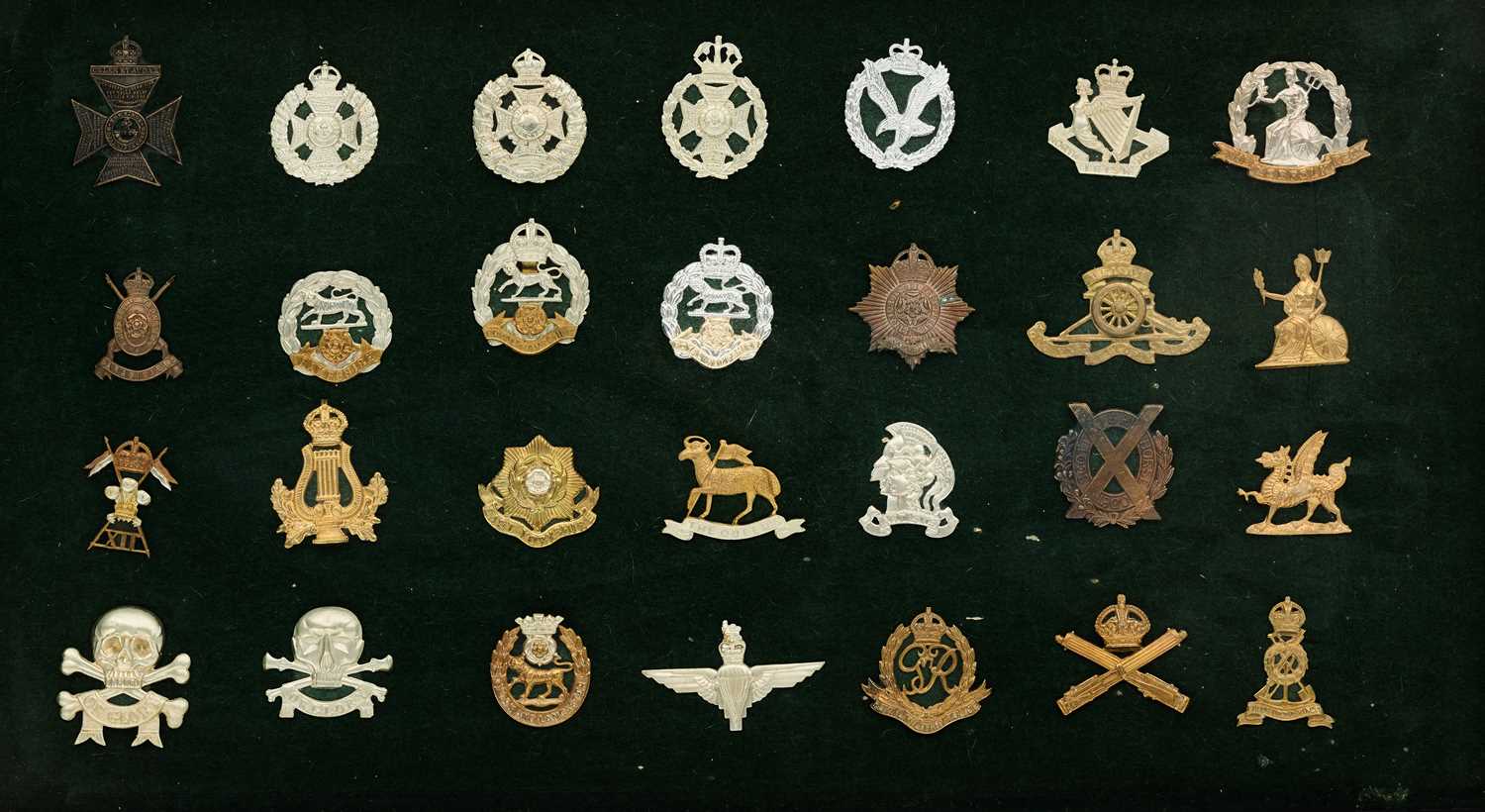 Lot 679 - A COLLECTION OF 28 METAL BRITISH MILITARY