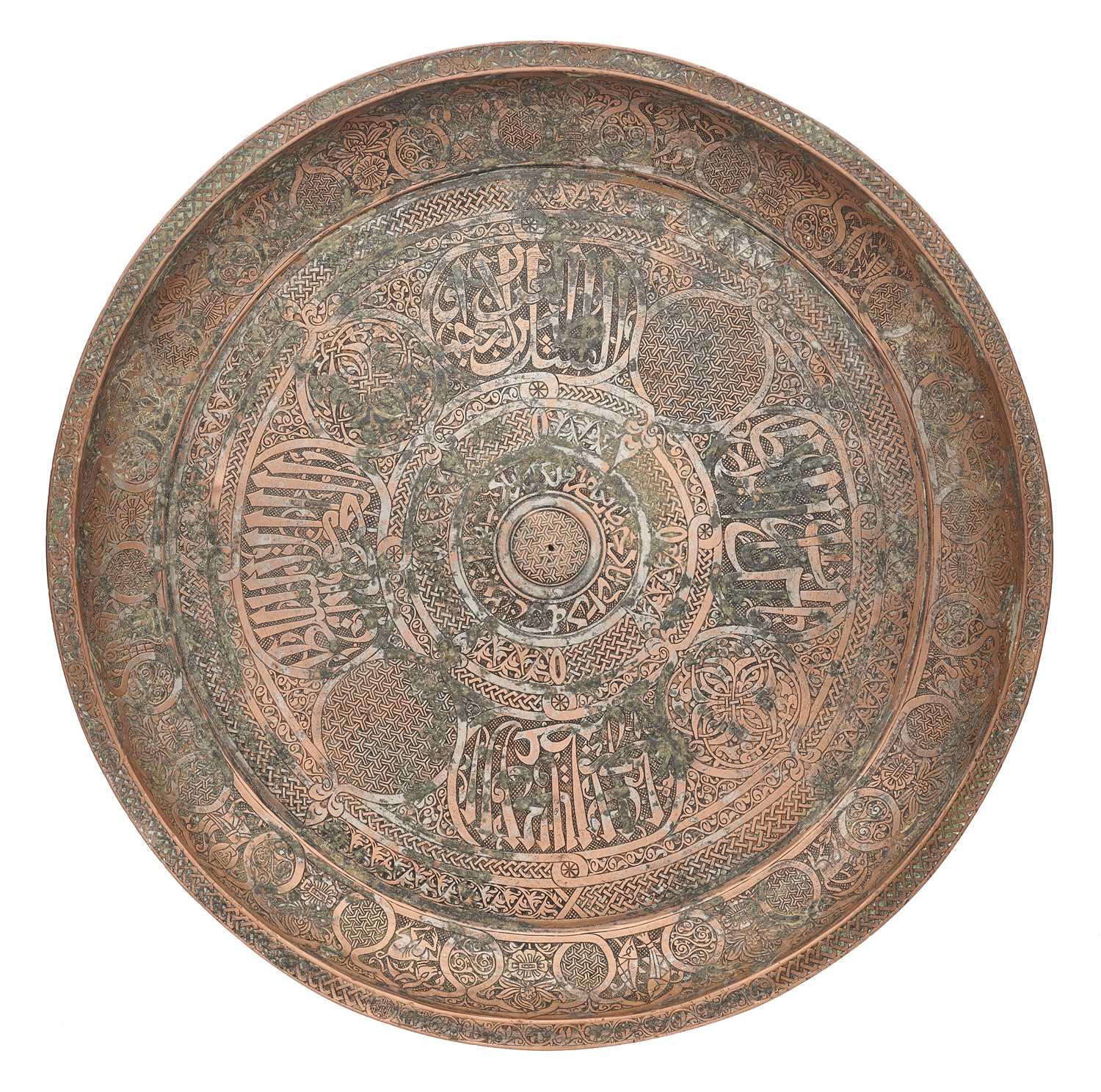 Lot 102 - A TIMURID ENGRAVED TINNED COPPER TRAY WITH