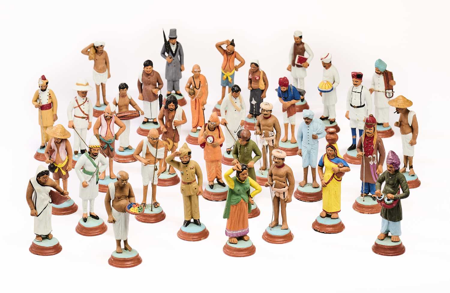 Lot 176 - A COLLECTION OF PAINTED CLAY FIGURES,