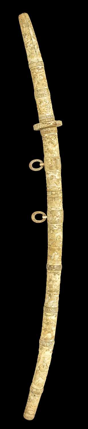 Lot 99 - ~AN EXCEPTIONALLY LARGE CARVED IVORY-MOUNTED