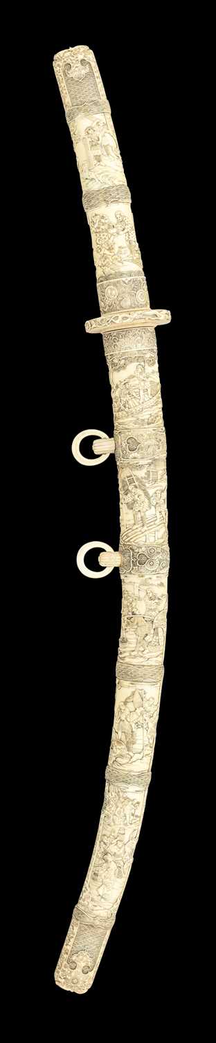 Lot 100 - ~A LARGE JAPANESE CARVED IVORY SWORD