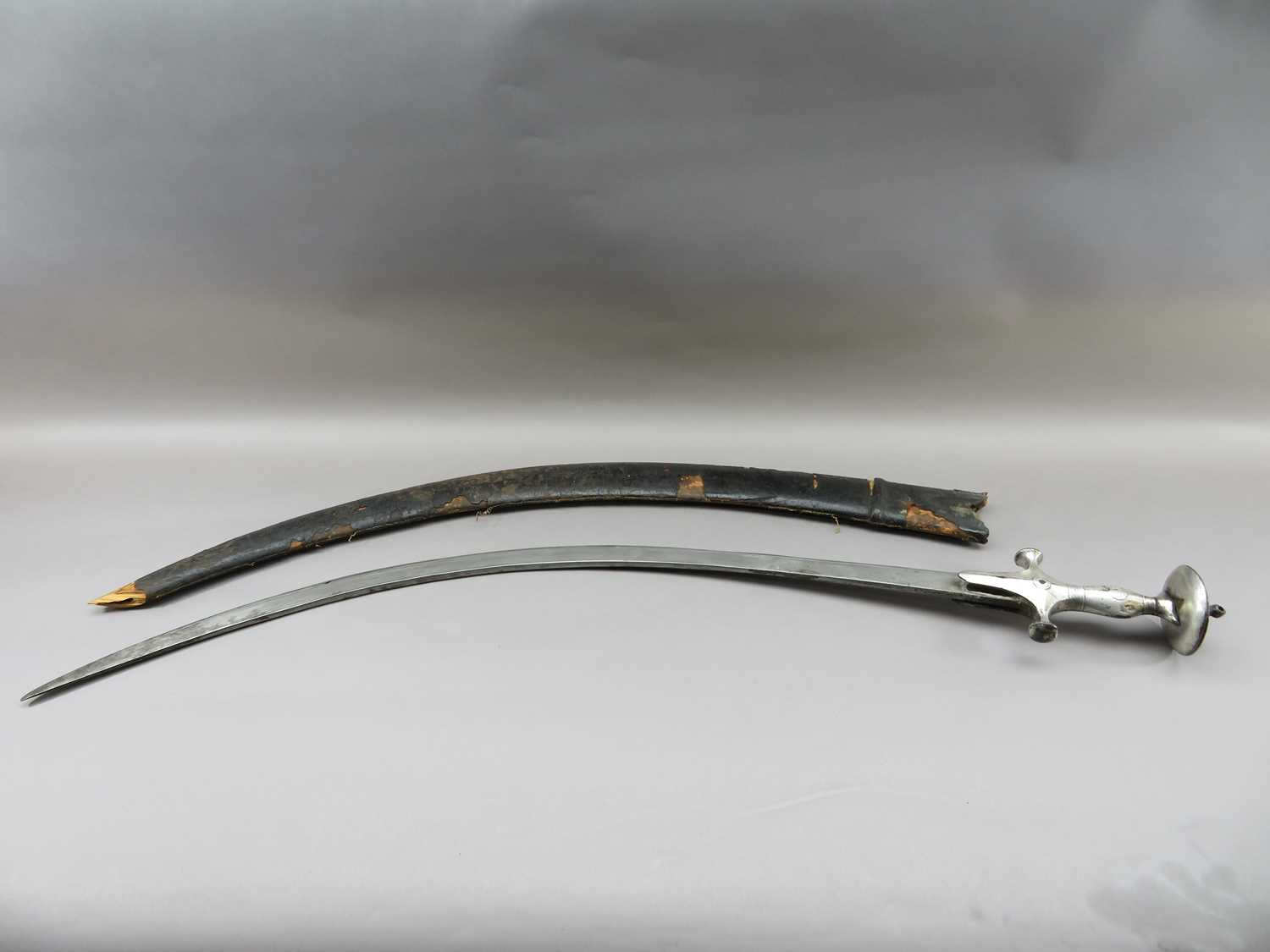 Lot 129 - â€¡AN INDIAN SWORD (TALWAR)