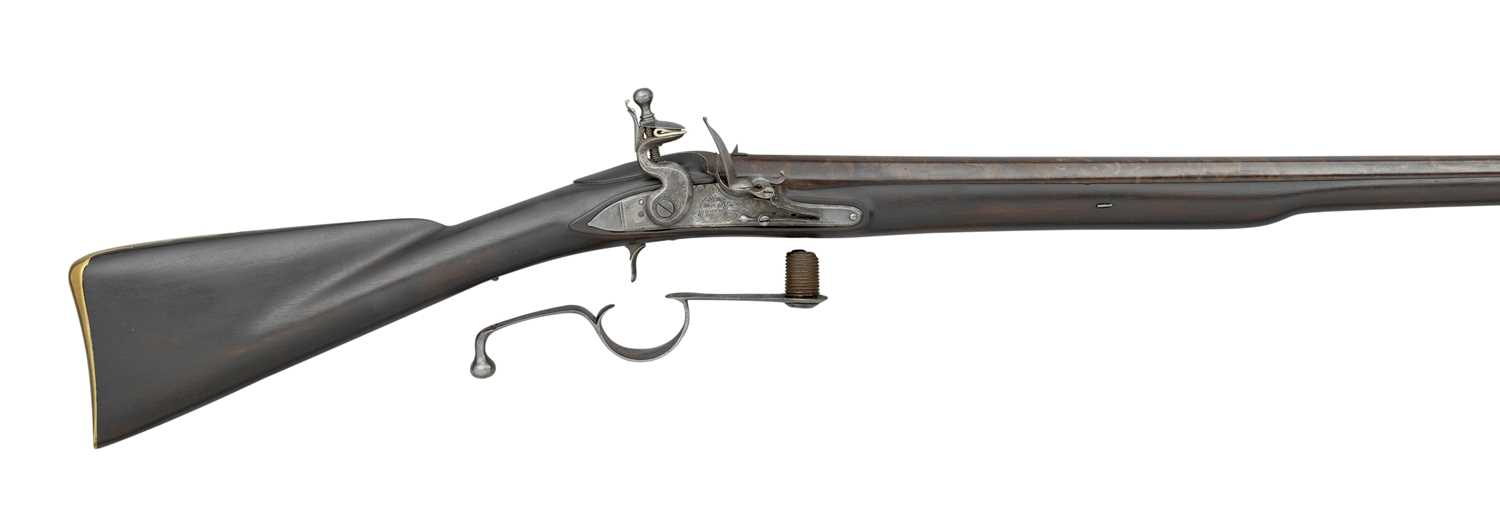Lot 357 - A RARE 0.75 CALIBRE BREECH-LOADING FLINTLOCK