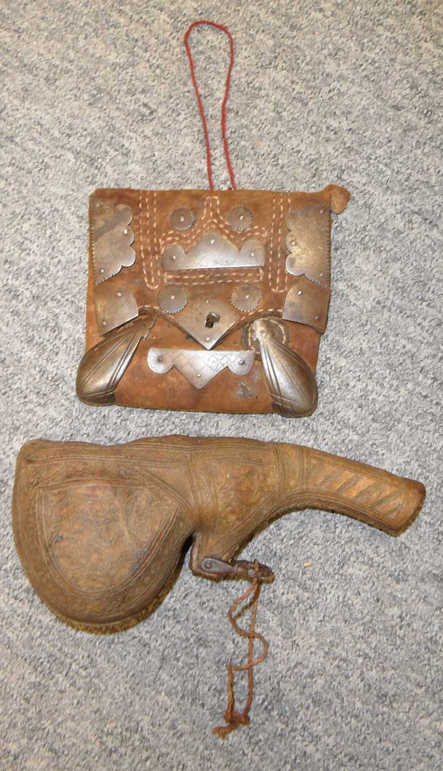 Lot 31 - A NORTH AFRICAN POWDER-FLASK AND POUCH