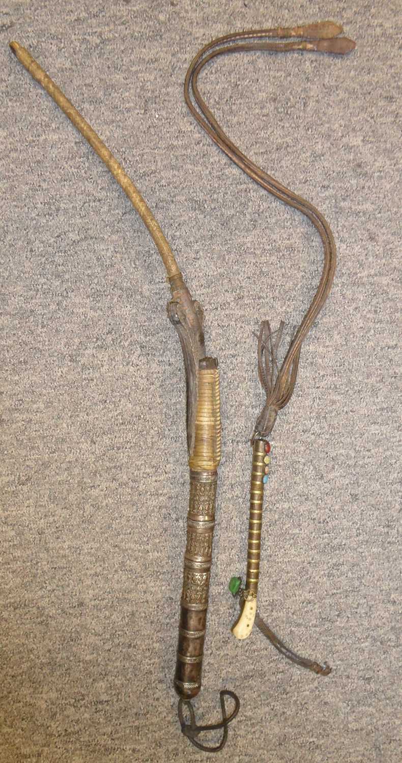 Lot 74 - AN AFRICAN AND A MIDDLE EASTERN WHIP