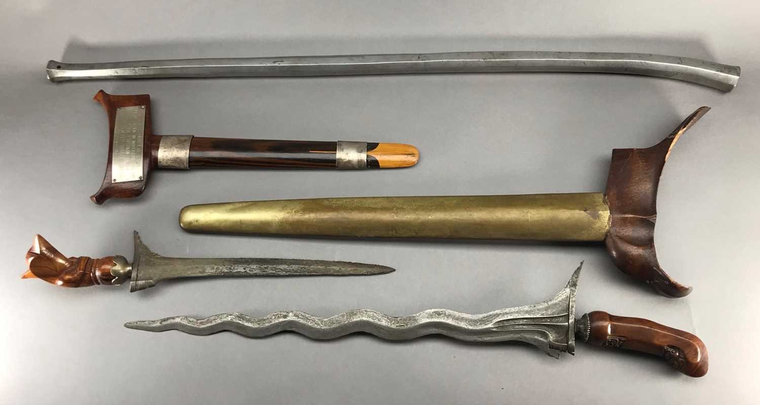 Lot 23 - â€¡AN INDONESIAN PRESENTATION KRIS, ANOTHER