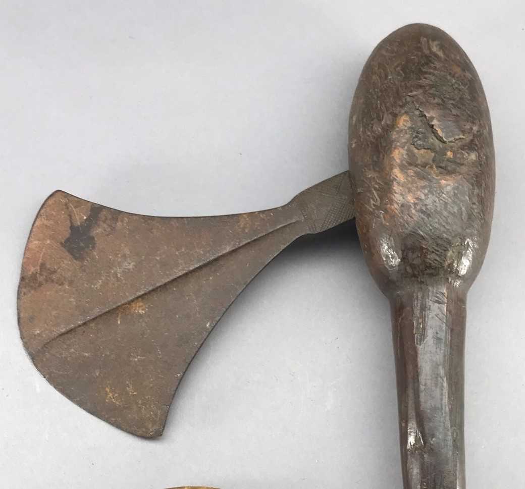 Lot 42 - â€¡A LARGE DECORATED AFRICAN AXE AND A KENYAN