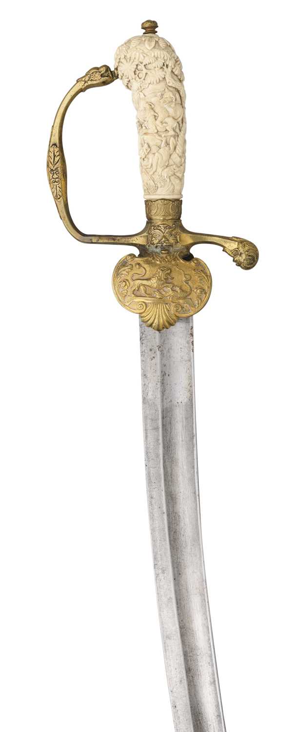 Lot 65 - ËœA GERMAN IVORY-MOUNTED HUNTING SWORD AND