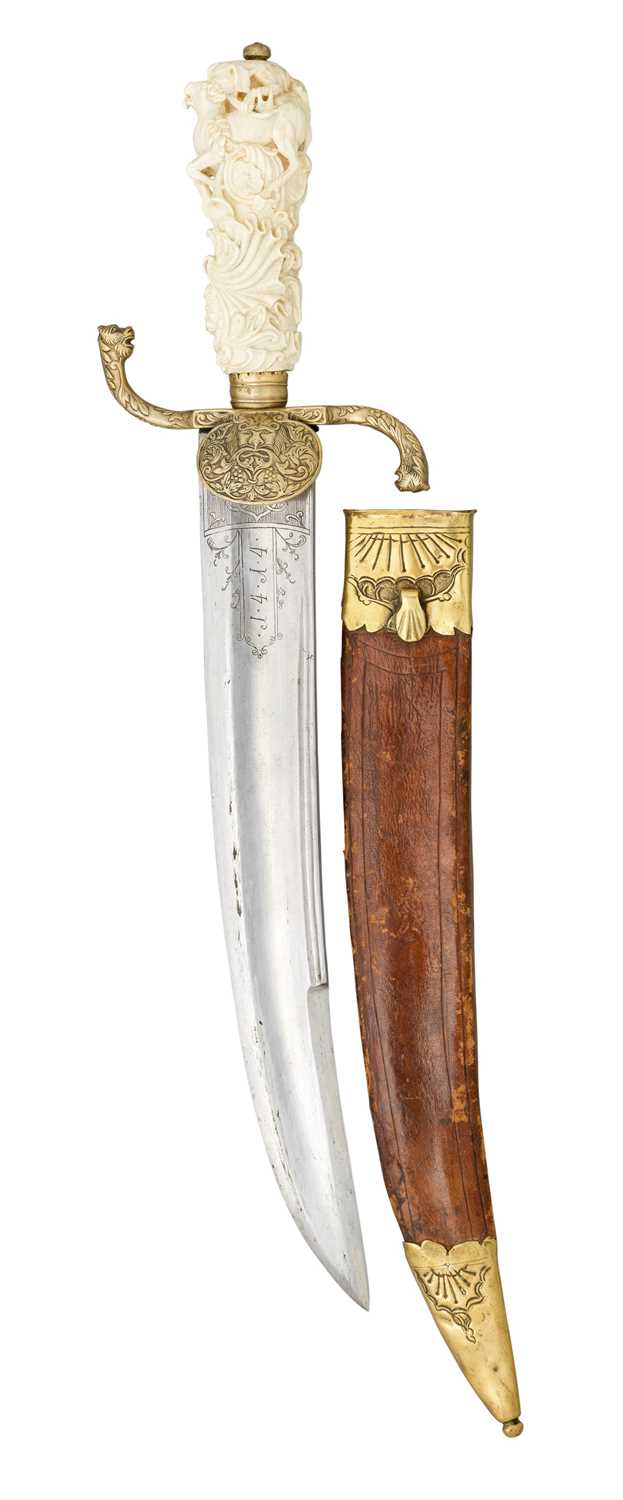 Lot 67 - ËœA COMPOSITE GERMAN IVORY-MOUNTED HUNTING